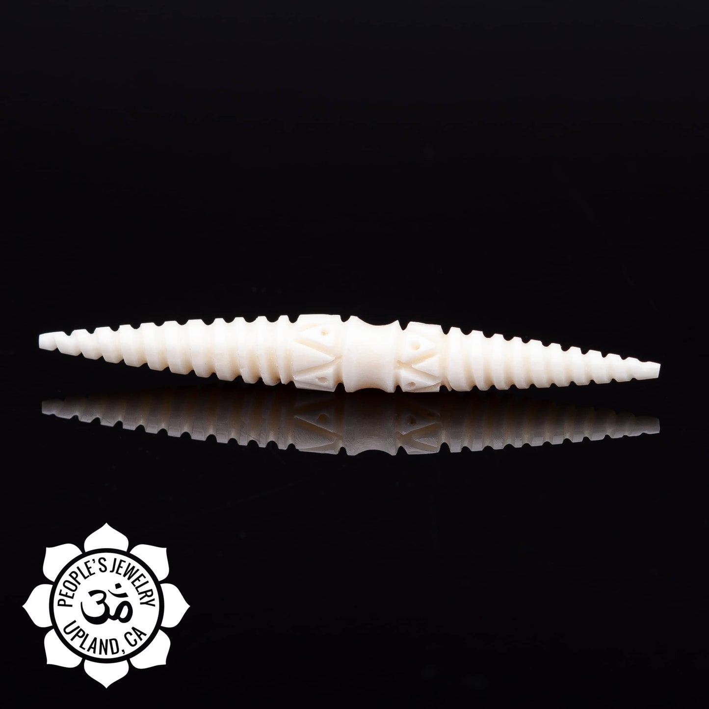 Carved Triangle Bone Spike by Peoples Jewelry – Laughing Buddha Studios ...
